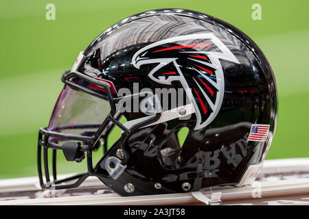 An Atlanta Falcons helmet sits on the field after an NFL football game ...