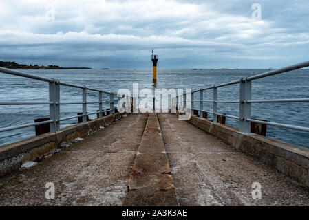 Roscoff harbour with dock jetty and sea background Stock Photo - Alamy