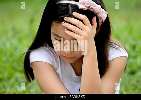 Youthful Asian Girl And Failure Stock Photo - Alamy