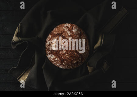 top of brown black wood table with blur party bokeh light in bar or pub ...