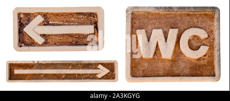 arrow sign showing WC (toilet) direction Stock Photo - Alamy