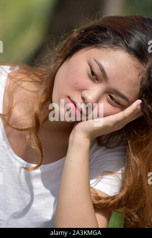 A Sad Filipina Person Stock Photo - Alamy