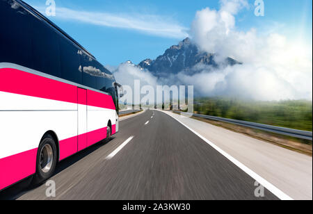 Unbranded white bus rushes along a highway Stock Photo - Alamy