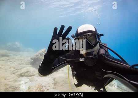 Diving Underwater Okay Stock Photo - Alamy
