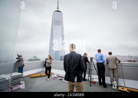 The almost finished One World Trade Center in New York with blue sky ...