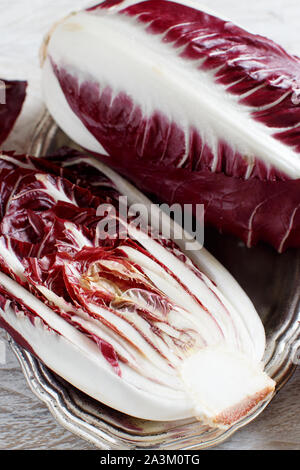 Raw red chicory on a tray close up Stock Photo - Alamy