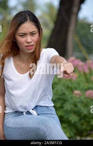 Minority Woman Pointing Stock Photo - Alamy