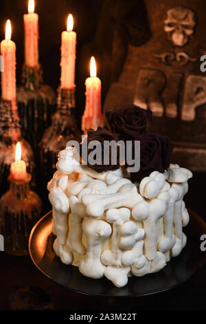 creepy cake (red velvet), decorated with meringue bones and drenched in ...