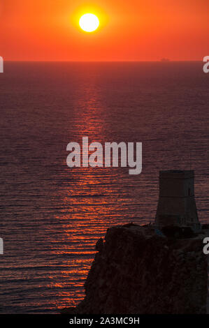 Sunset over Ghajn Tuffieha Bay in Malta Stock Photo - Alamy