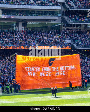 AFL grand final supporters banner Stock Photo - Alamy