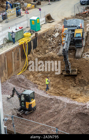 Construction work, dredging a construction pit for a residential ...