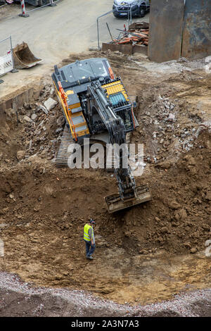 Construction work, dredging a construction pit for a residential ...