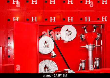 Complete mandatory fire hydrant and hose equipment Stock Photo - Alamy