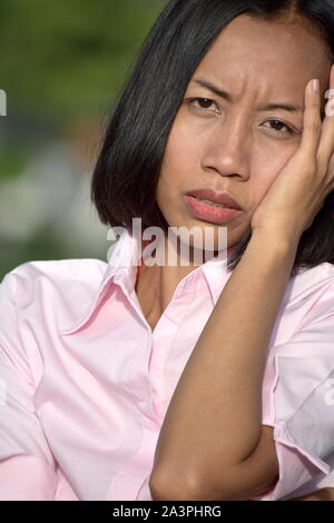Worrisome Youthful Asian Adult Female Stock Photo - Alamy