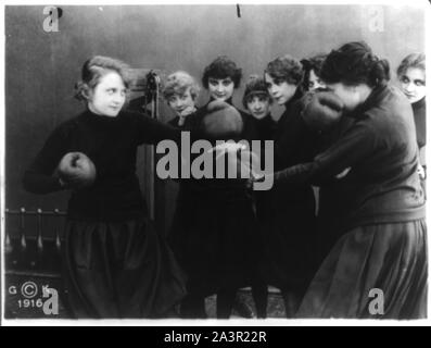 Starring in motion picture, "Gloria's Romance", 1916: boxing with woman ...