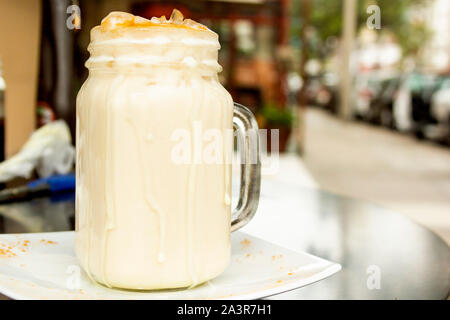 Venezuelan juice typical chicha, rice milk and cinnamon Stock Photo - Alamy