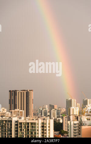 Beautiful rainbow over city apartments after heavy storm Stock Photo ...
