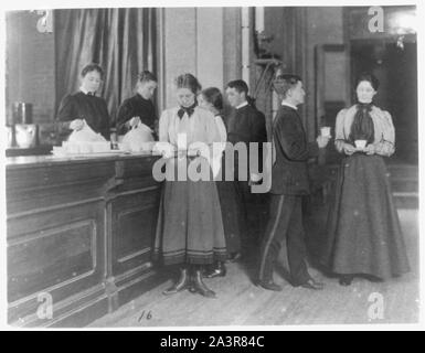 Students getting beverages from a counter, Western High School ...