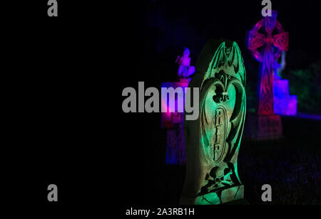 Neon Cemetery Tombstones with Black Copy Space Stock Photo - Alamy