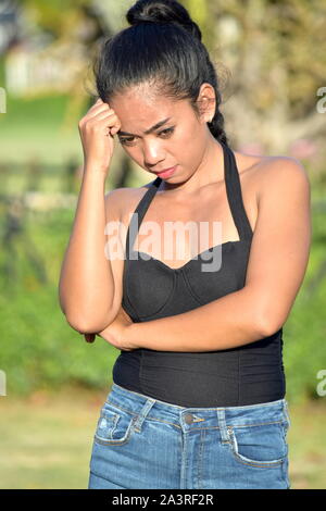A Worrisome Adult Female Stock Photo - Alamy
