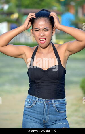 An A Stressed Asian Person Stock Photo - Alamy