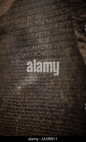 The Rosetta Stone script up close Stock Photo - Alamy