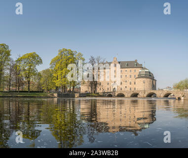 Bridge and the Orebro Castle at the river Svartan, Orebro, Sweden Stock ...