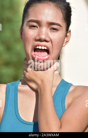 Filipina Female Choking Stock Photo - Alamy