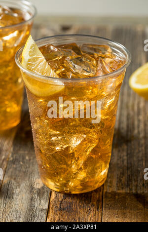 Delicious iced tea in glass on white background Stock Photo - Alamy
