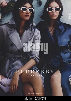 poster advertising Burberry fashion house with Emma Watson in paper ...