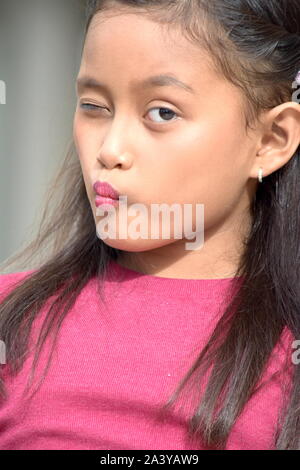 A Tween Making Funny Faces Stock Photo - Alamy