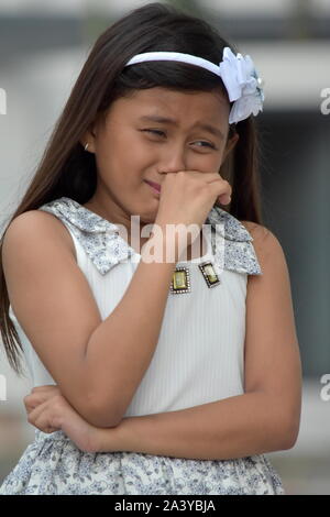 A Crying Filipina Female Stock Photo - Alamy
