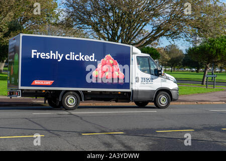 Freshly Clicked Tesco advert on the side of a Tesco delivery van in New ...