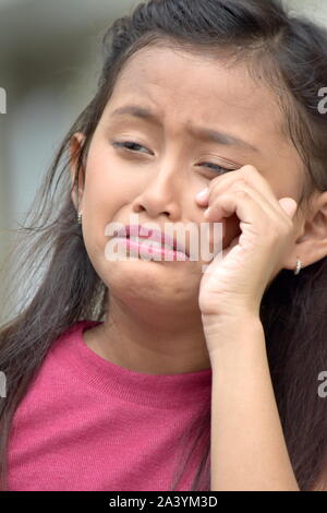 A Crying Cute Filipina Girl Stock Photo - Alamy