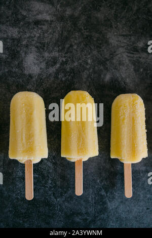 Row of lemon ice pops Stock Photo - Alamy