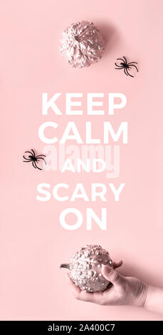 Halloween paper decorations on pastel pink background. Halloween ...