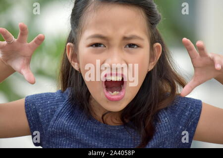 An An Intimidating Filipina Female Juvenile Stock Photo - Alamy