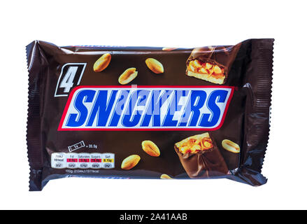 Pack of 4 Snickers chocolate bars with one removed UK isolated on white ...