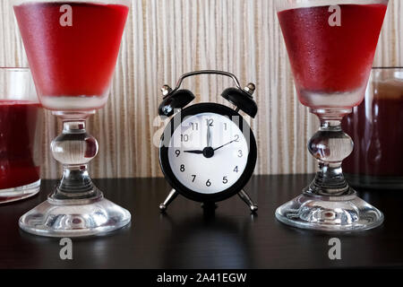 8 o'clock of retro vintage clock with red heart and sun light morning ...