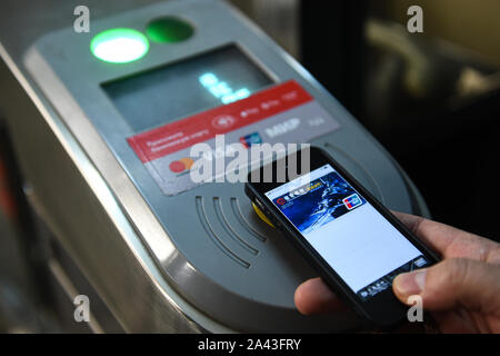 The fare payment gates at a metro station in Doha, Qatar. They operate ...