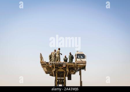 Service members in the CENTCOM area of responsibility prepare to board ...