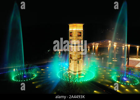 Water dances along as the music plays during a musical fountain light ...