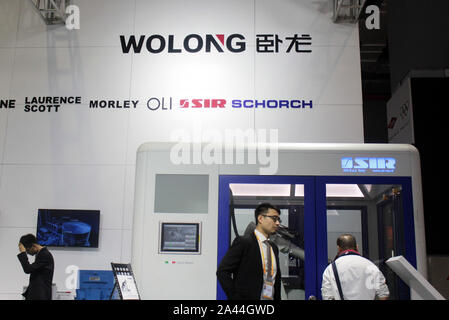 --FILE--People visit the stand of Wolong LDG during the first China ...