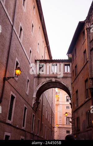 Romanesque arch in red brick with keystone and plate tracery in Saint ...
