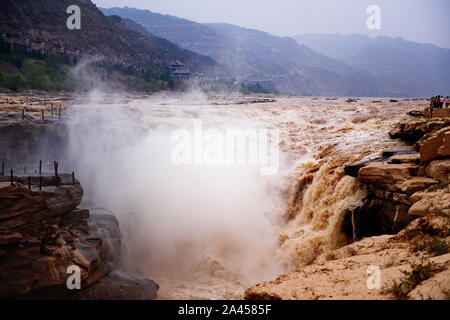 Landscape of the roaring Hukou Waterfall after torrential rains on the ...