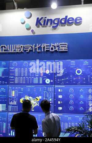 --FILE--People visit the stand of Kingdee International Software Group ...