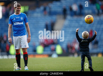 Steven Gerrard with his son Lio on the pitch after the legends match at ...