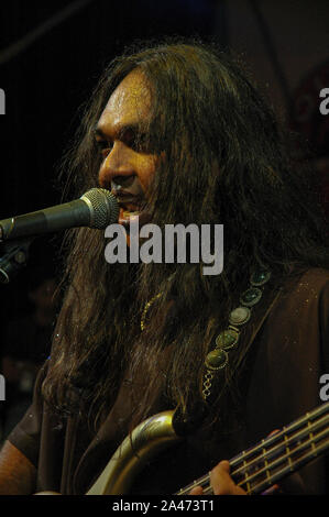 Bangladeshi band singer Biplob performs on a stage in Dhaka, Bangladesh ...