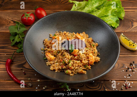 ebi chahan fried japanese rice with vegetables, shrimp and soy sauce in ...