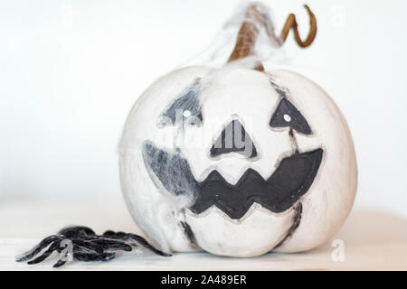 White halloween pumpkin with spider web and spider. With Trick or treat ...